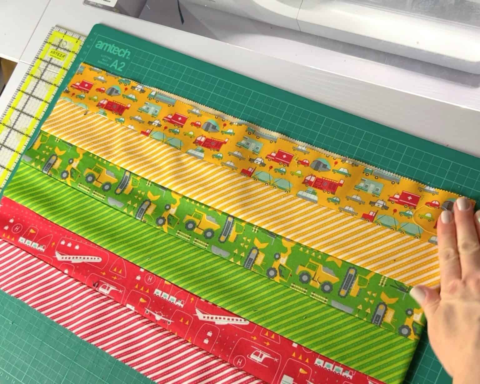 Easy Stroller Quilt from 7 Jelly Roll Strips! - Scrap Fabric Love